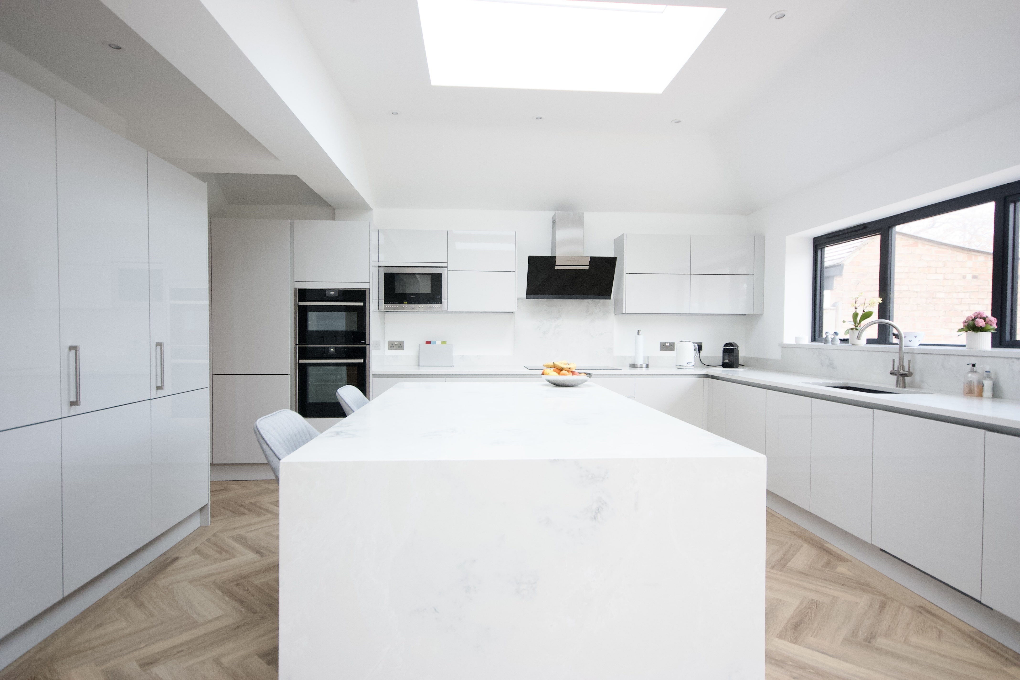 Mr & Mrs Howe’s Light Grey Minimalist Handleless Kitchen - Ream Interiors